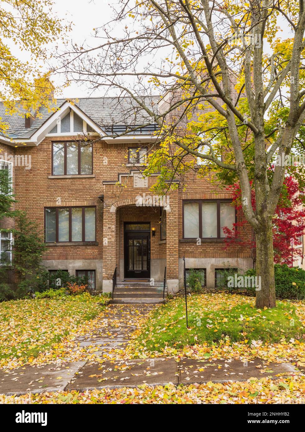 1924 traditional two story brick cladded semi-detached cottage style ...