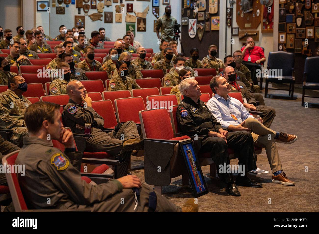 Participants from Red Flag-Nellis 22-3 sit with retired Col. John “JB ...
