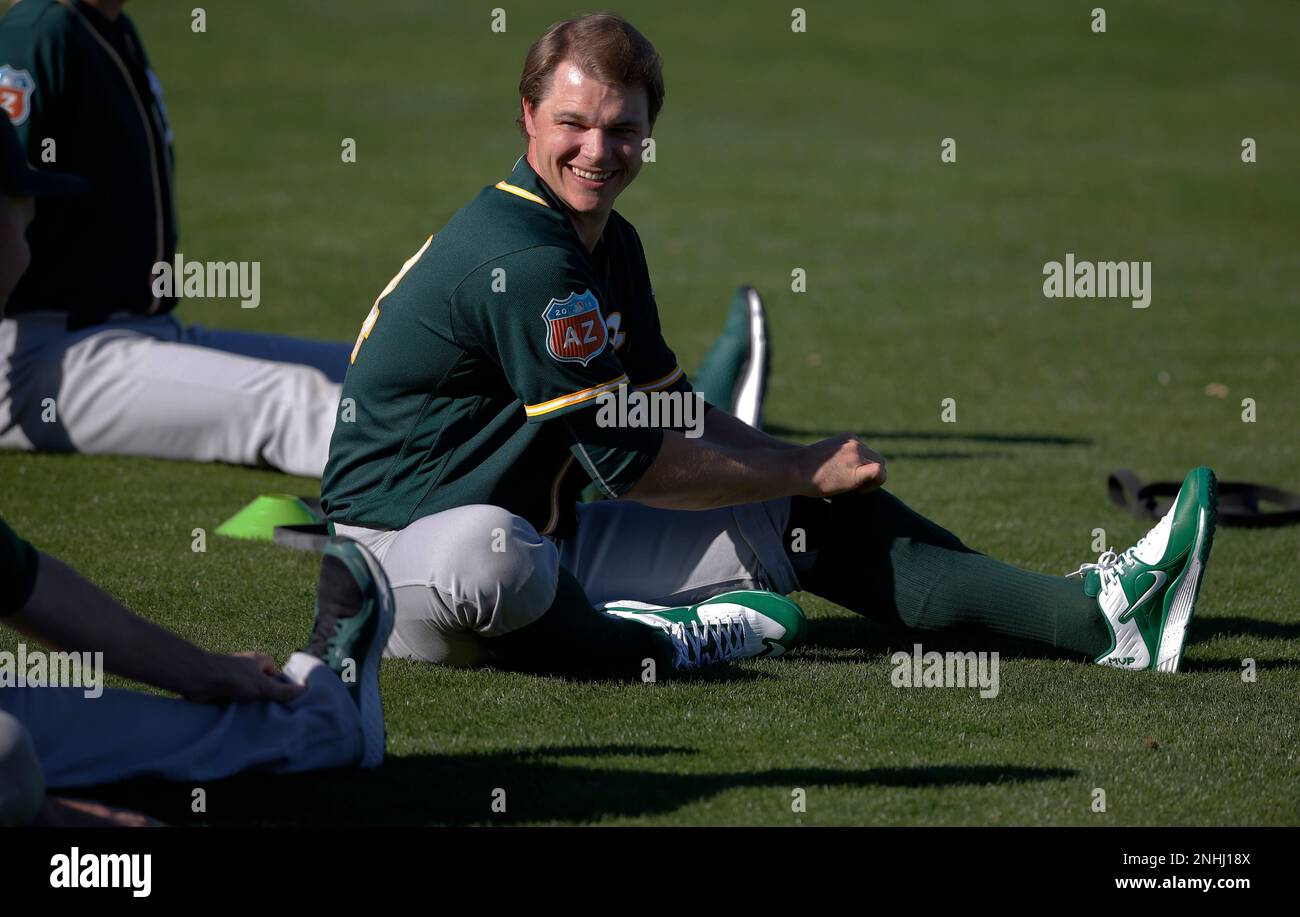 Pitcher Sonny Gray, 54 begins the day with stretches during spring ...