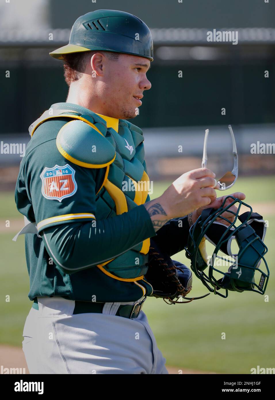 Bruce Maxwell, 63 gets ready to catch during Oakland Athletics spring ...