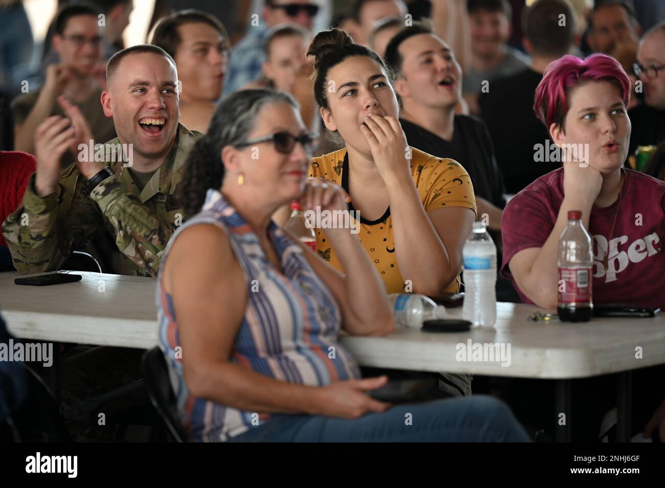 Families of the 898th Munitions Squadron personnel watched and celebrated as teams participated ...