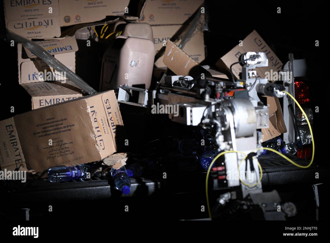 After tearing through several boxes containing only water bottles, an ...