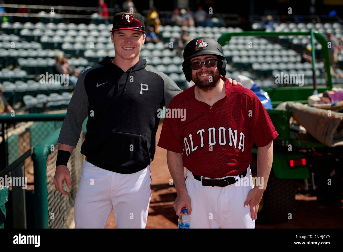 Altoona Curve catcher Henry Davis poses for a photo with the bat boy ...