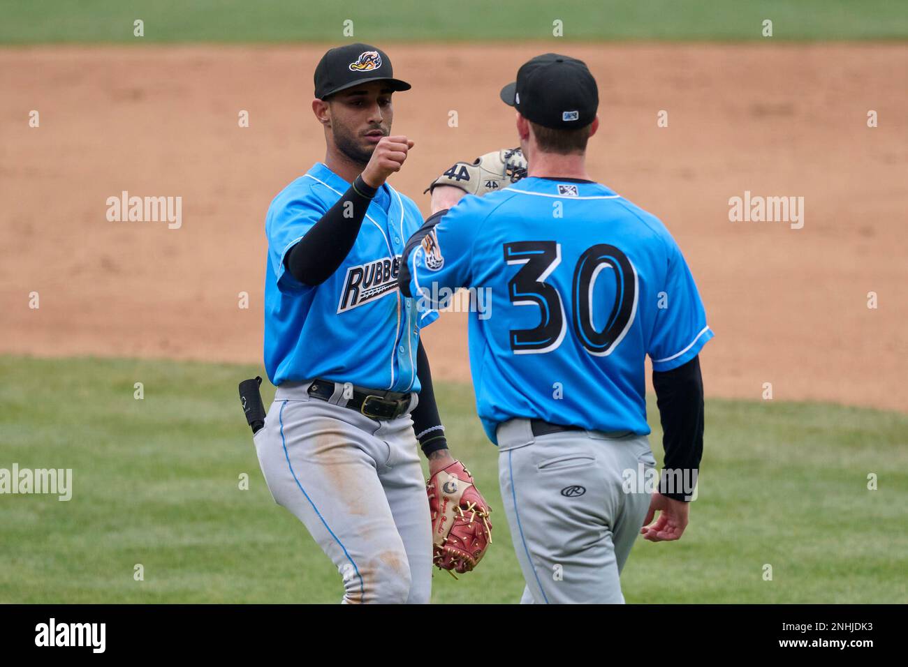Akron RubberDucks shortstop Brayan Rocchio (4) congratulates pitcher ...