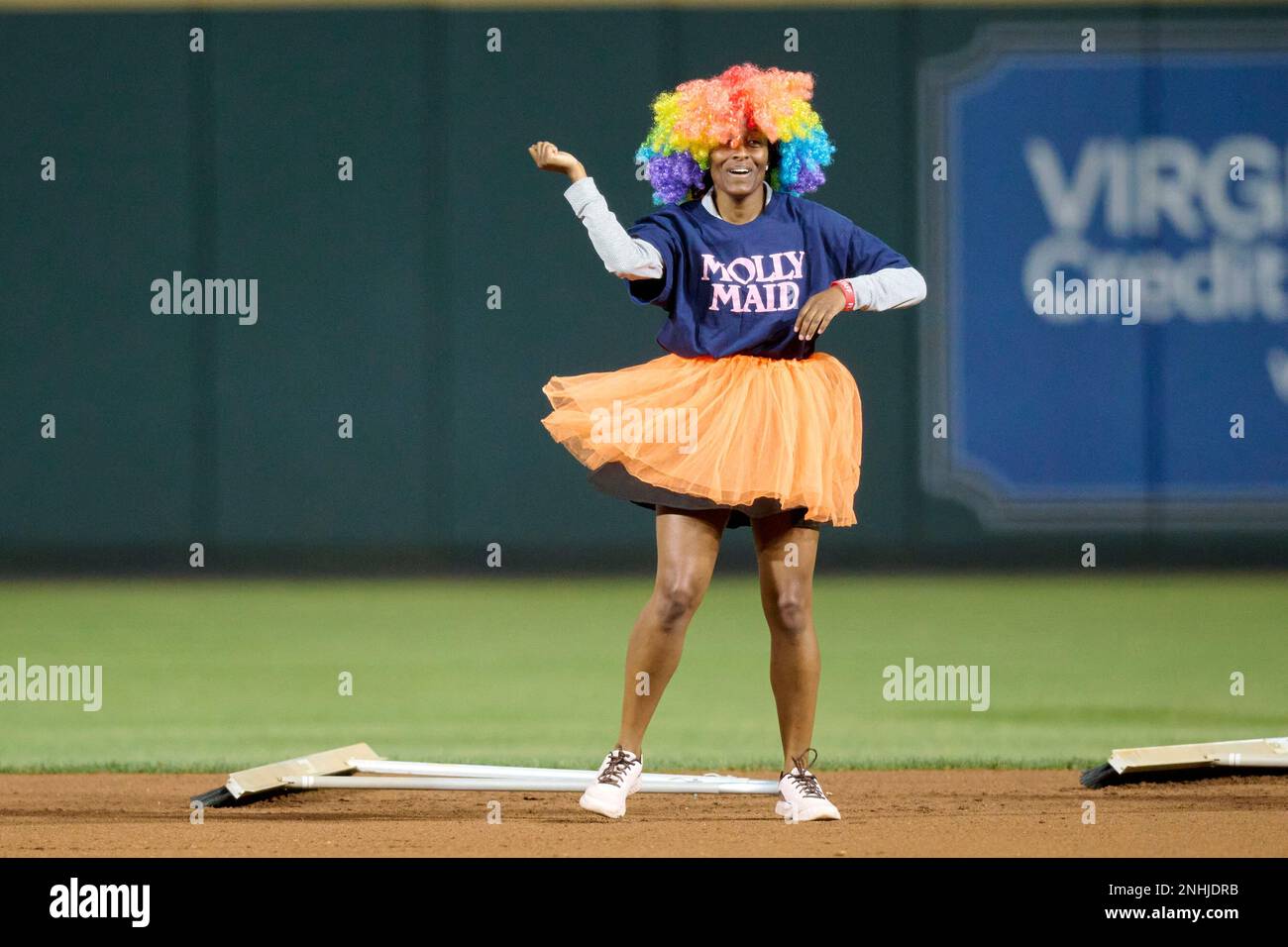 On field entertainment between innings, Molly Maid dancing ground screw ...