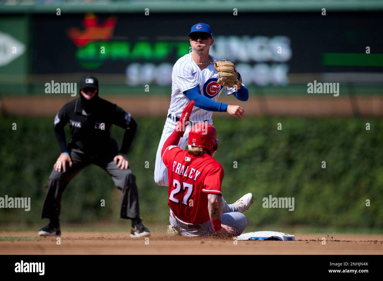 Chicago Cubs second baseman Zach McKinstry (6) turns a double play as ...