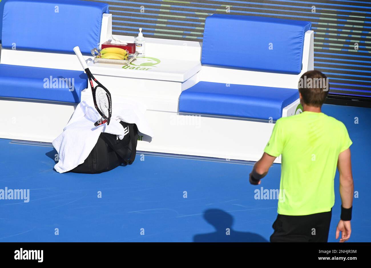 Doha, Qatar. 21st Feb, 2023. Ilya Ivashka of Belarus throws the broken ...