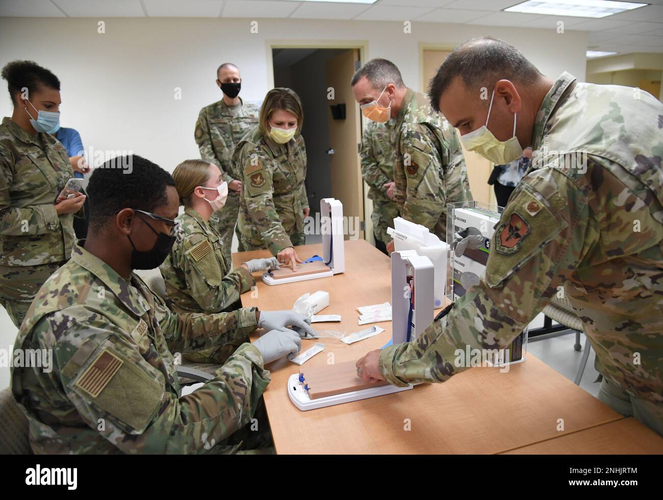 Members of the 81st Medical Group provide an IV training demonstration ...