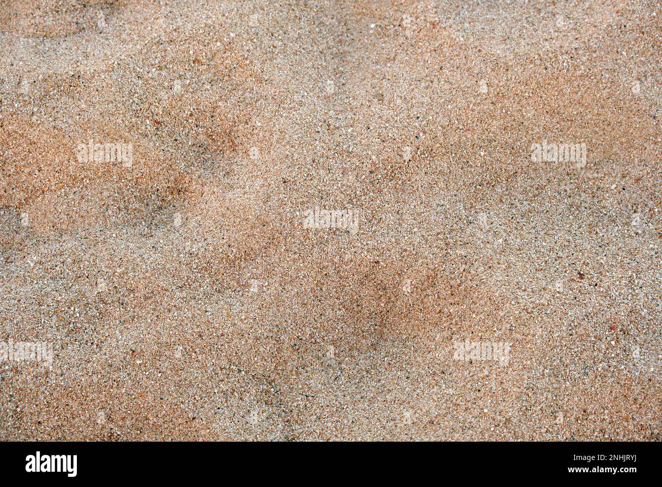 Flat view of clean yellow sand surface covering seaside beach. Sandy ...