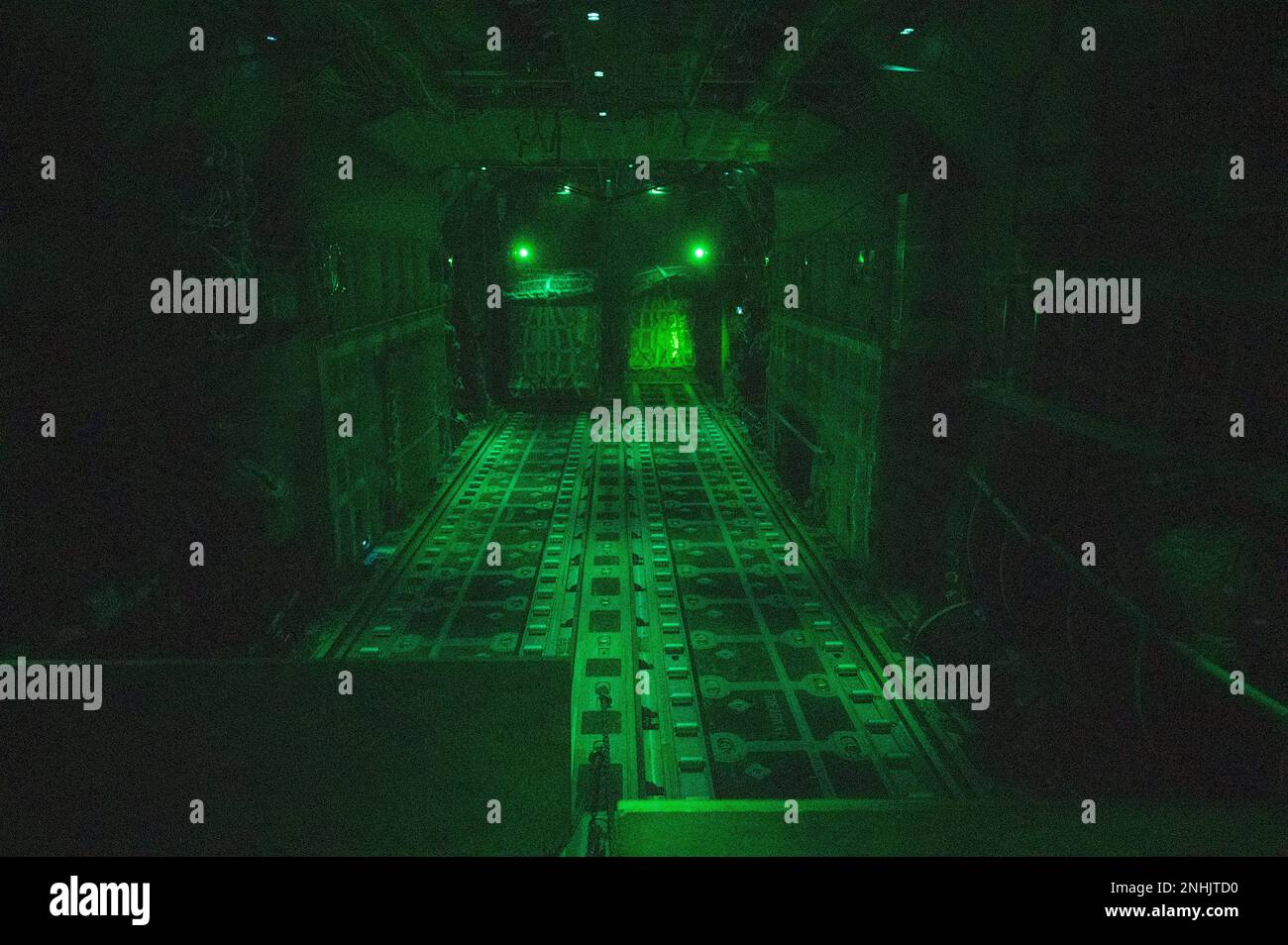 A U.S. Air Force HC-130J Combat King II aircraft releases airdrop ...