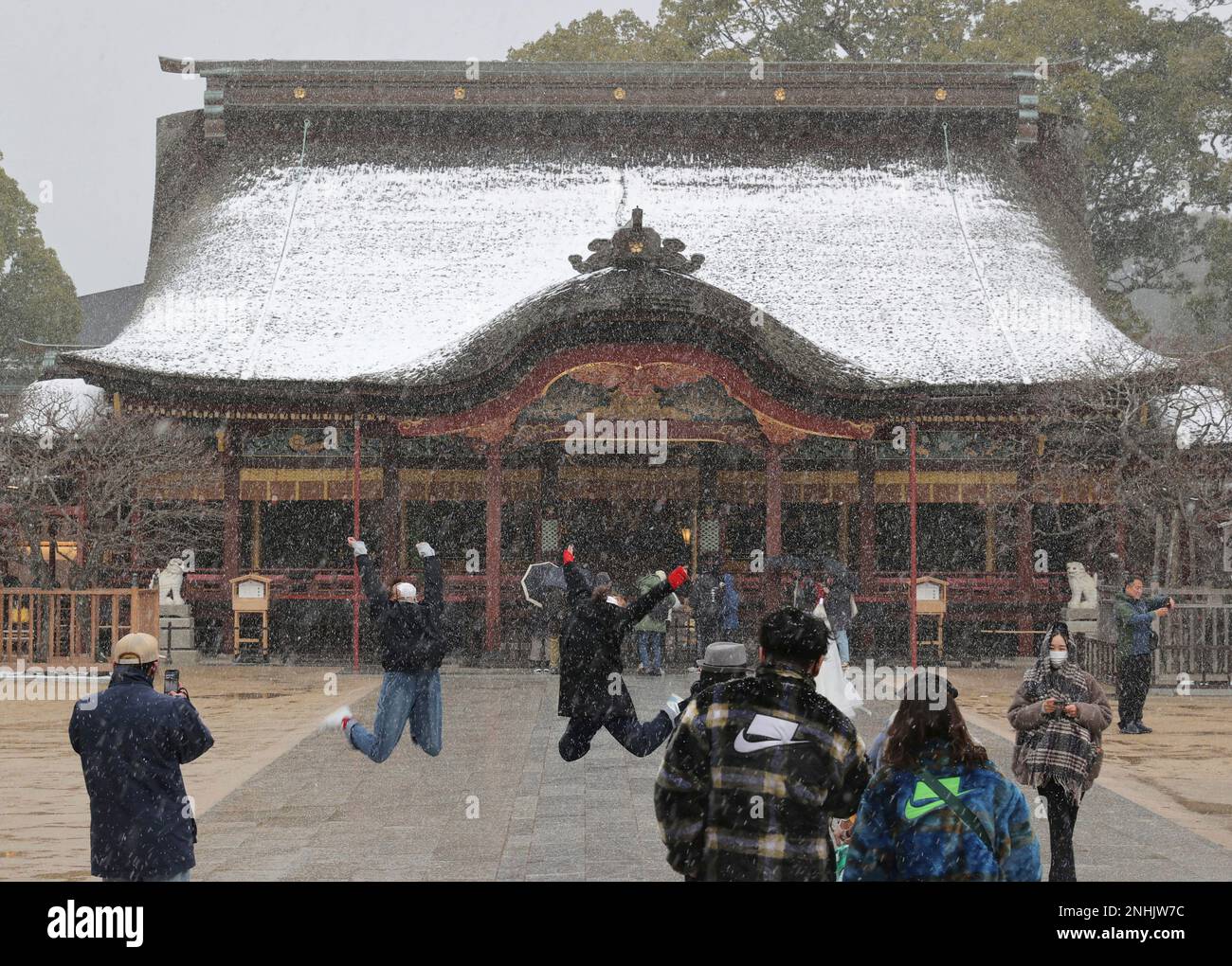A hall building of Dazaifu Tenmangu Shrine is covered with snow in ...