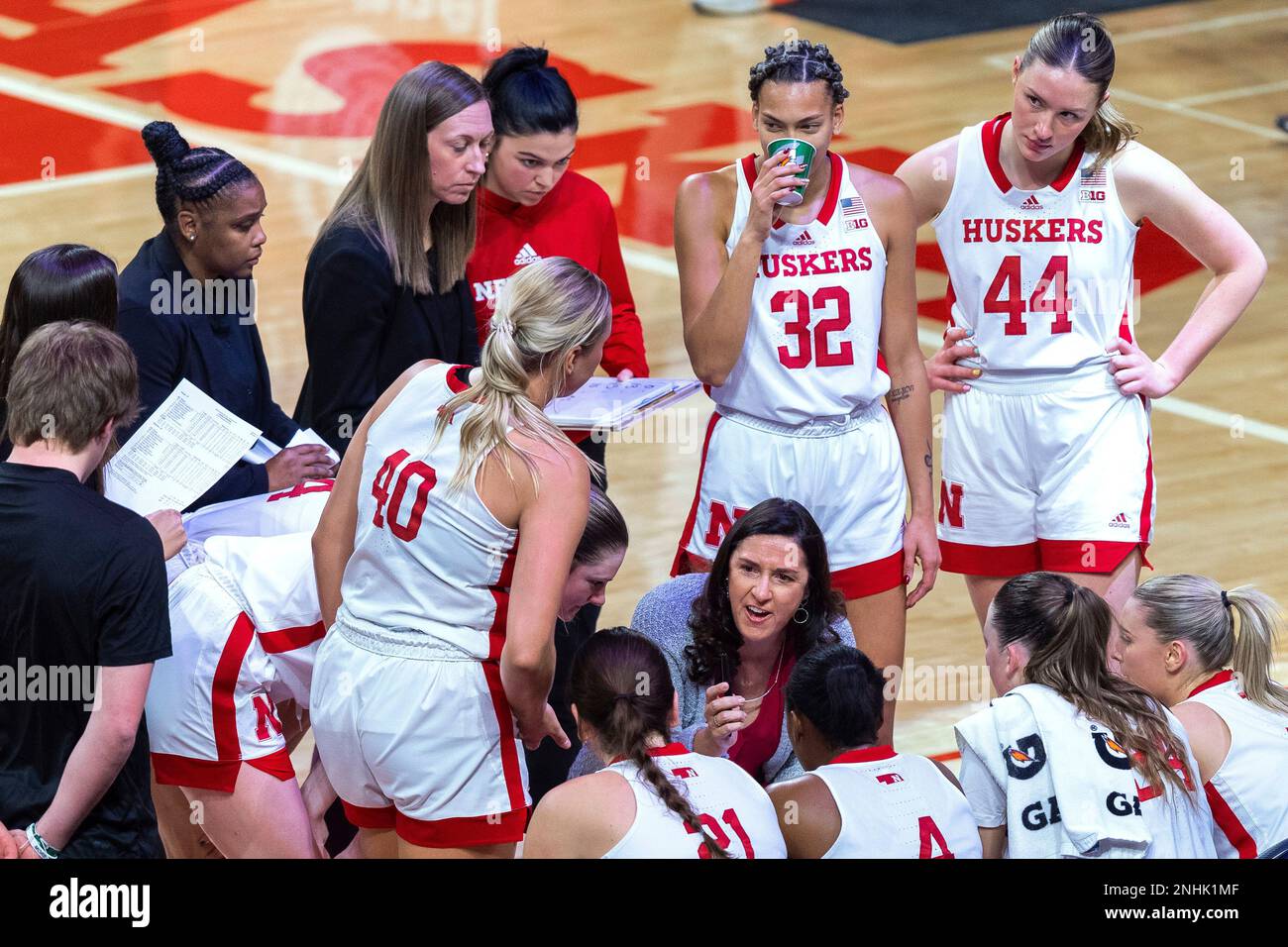 Nebraska coach Amy Williams speaks with the team during a timeout in the first half of the team ...