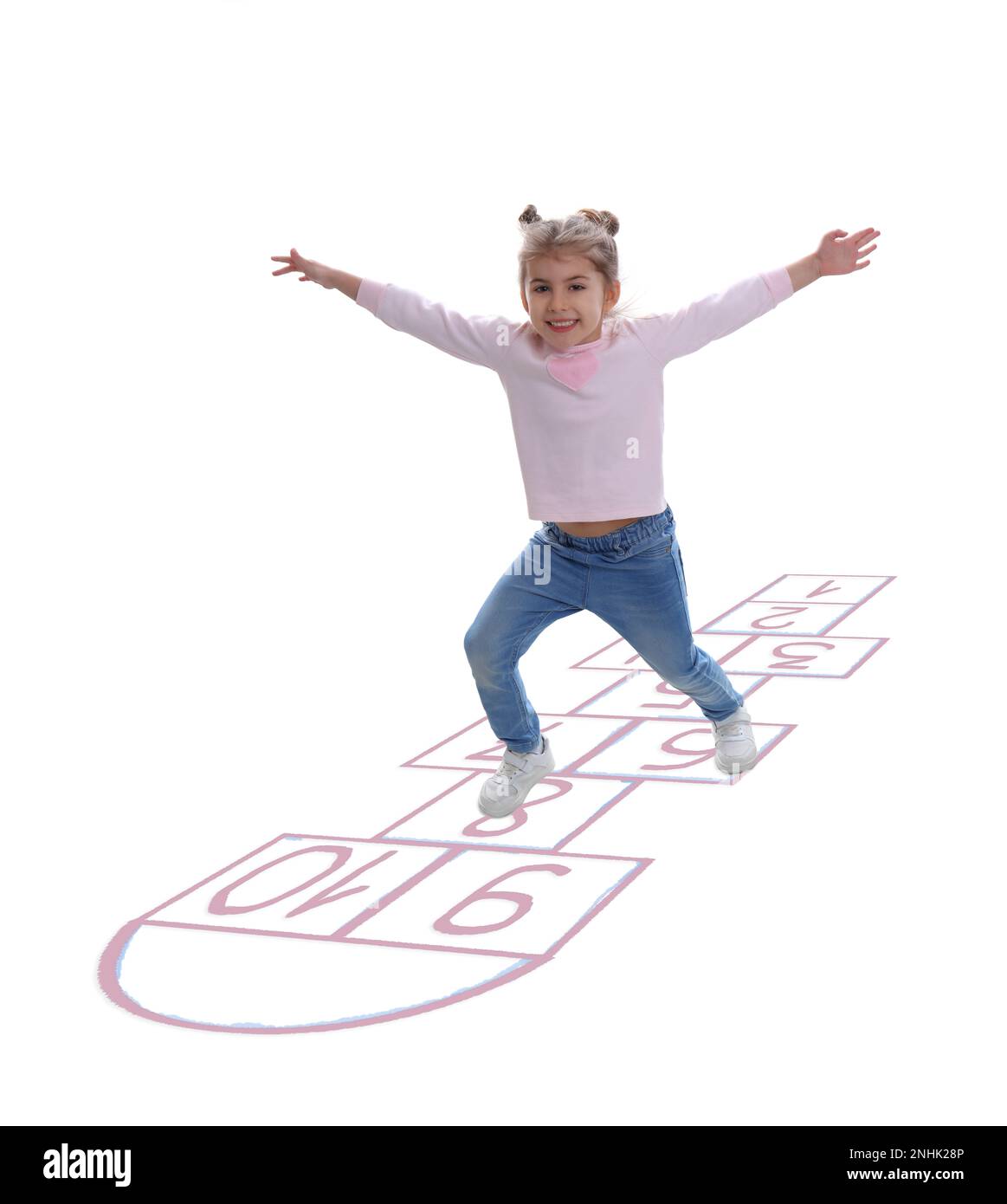 Cute little girl playing hopscotch on white background Stock Photo - Alamy