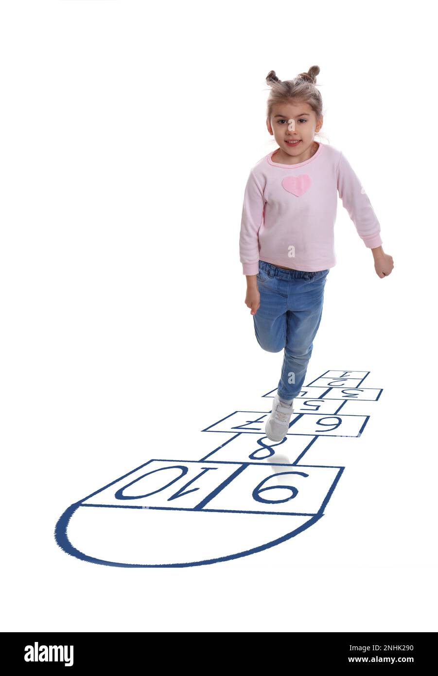 Cute little girl playing hopscotch on white background Stock Photo - Alamy