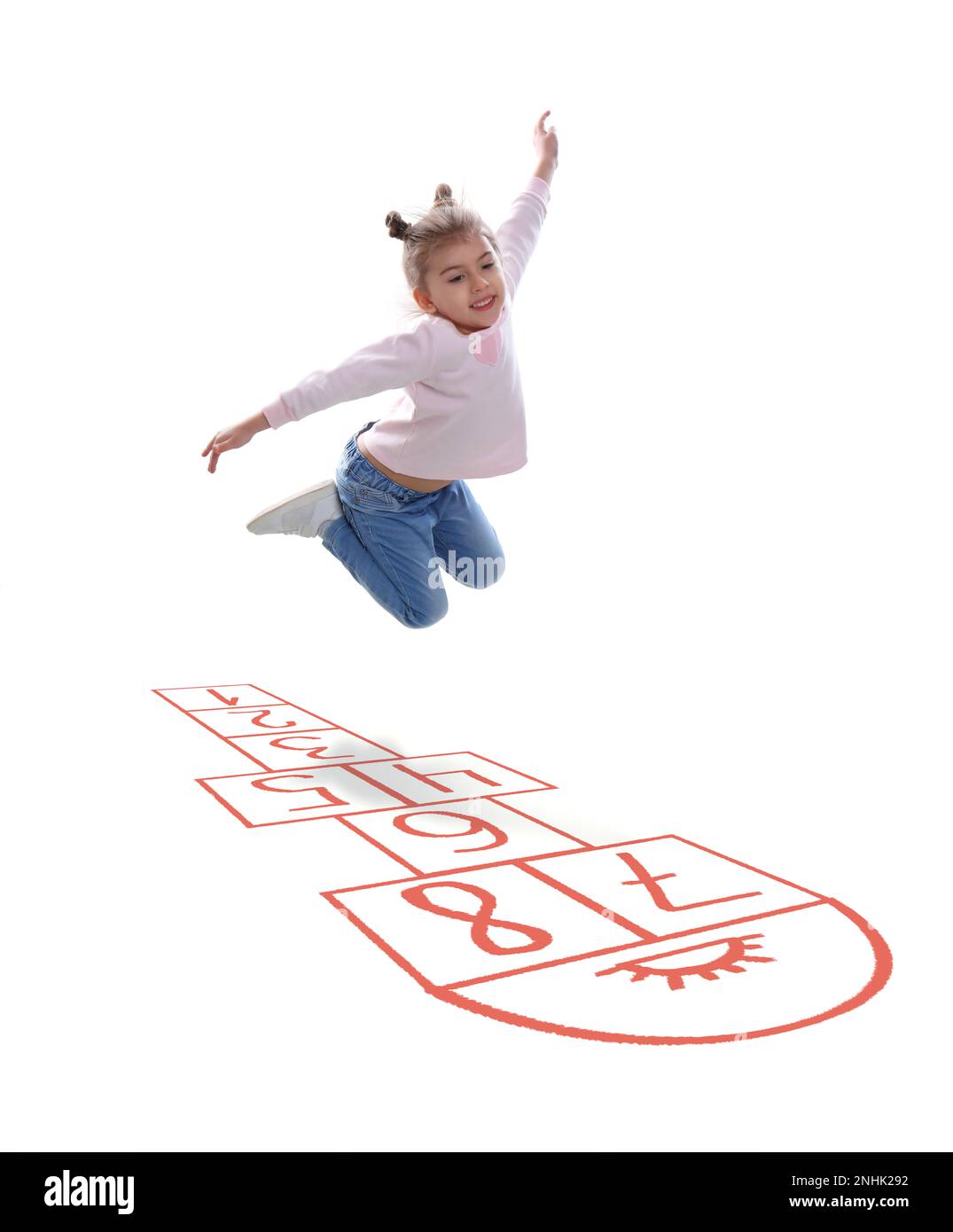 Cute little girl playing hopscotch on white background Stock Photo - Alamy