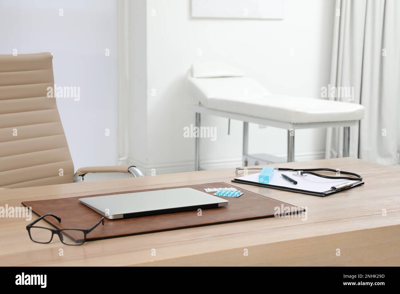Modern doctor's workplace in office. Interior design Stock Photo - Alamy