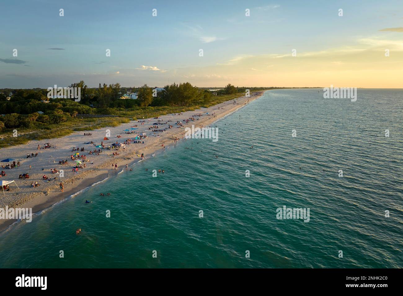 Nokomis beach with soft white sand in Sarasota county, USA. Many people ...