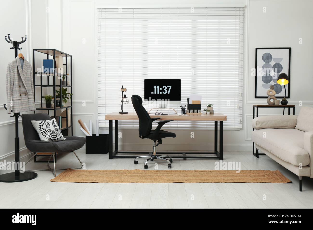 Home office interior with comfortable workplace near window Stock Photo ...