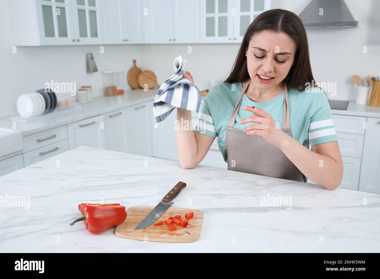 Woman vegetable cut finger hi-res stock photography and images - Alamy