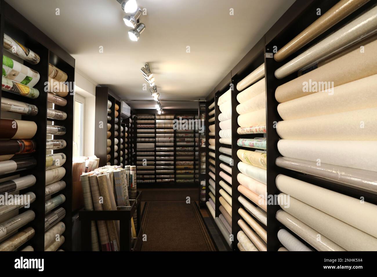 Assortment of stylish wall papers in shop Stock Photo - Alamy