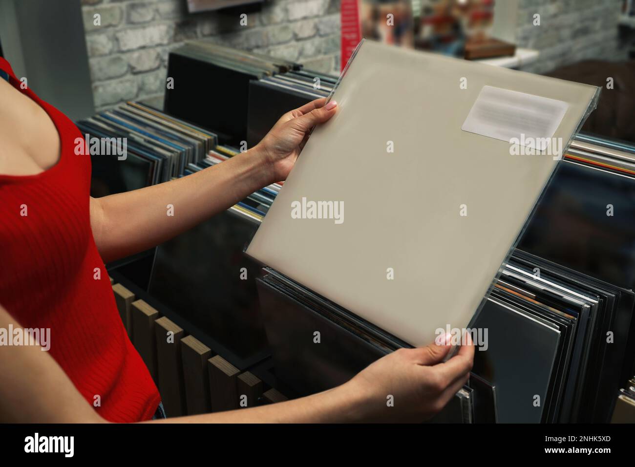 Woman in record store hi-res stock photography and images - Alamy