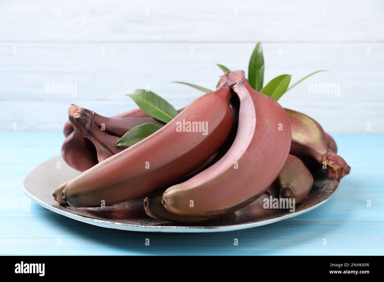 Baby bananas on blue hi-res stock photography and images - Alamy