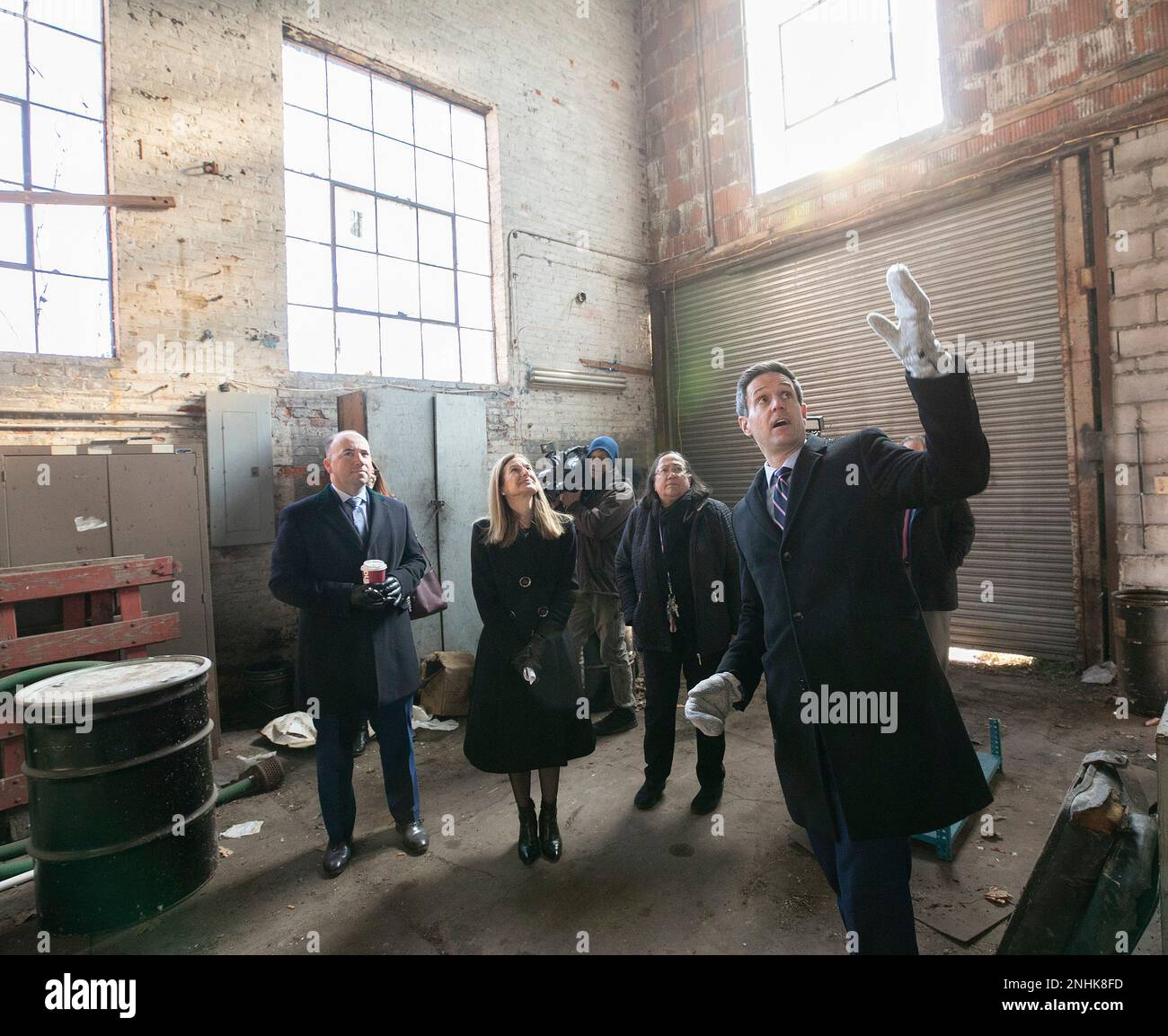 Dan Drazen, vice president of development for Trinity Financial, right, leads city and state ...