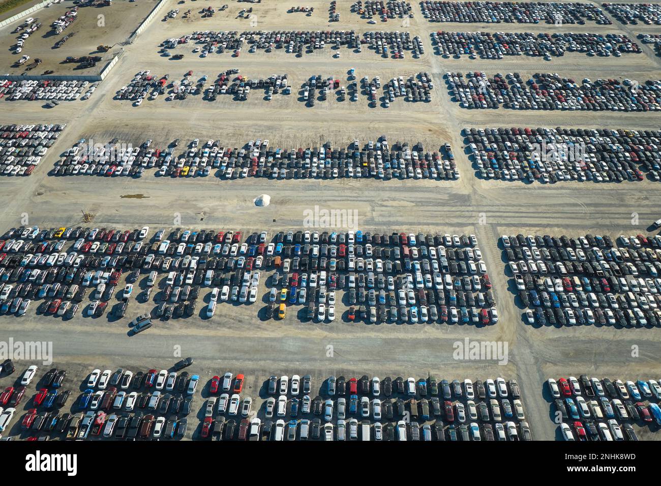 Used damaged cars on auction reseller company big parking lot ready for ...