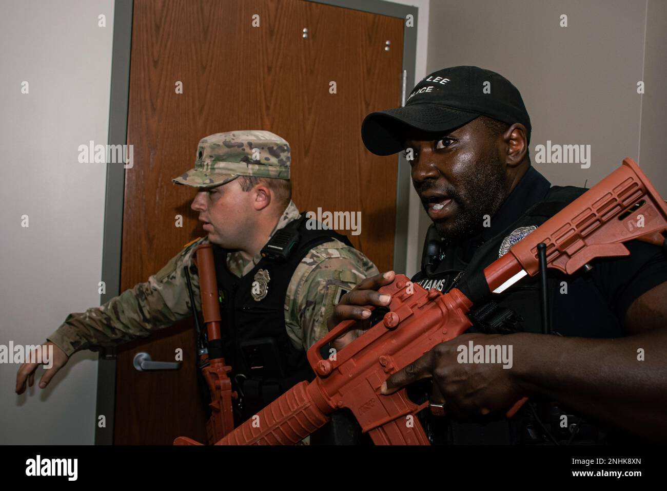 Antonio Williams (right), a patrol officer for Fort Lee Police, and Spc ...