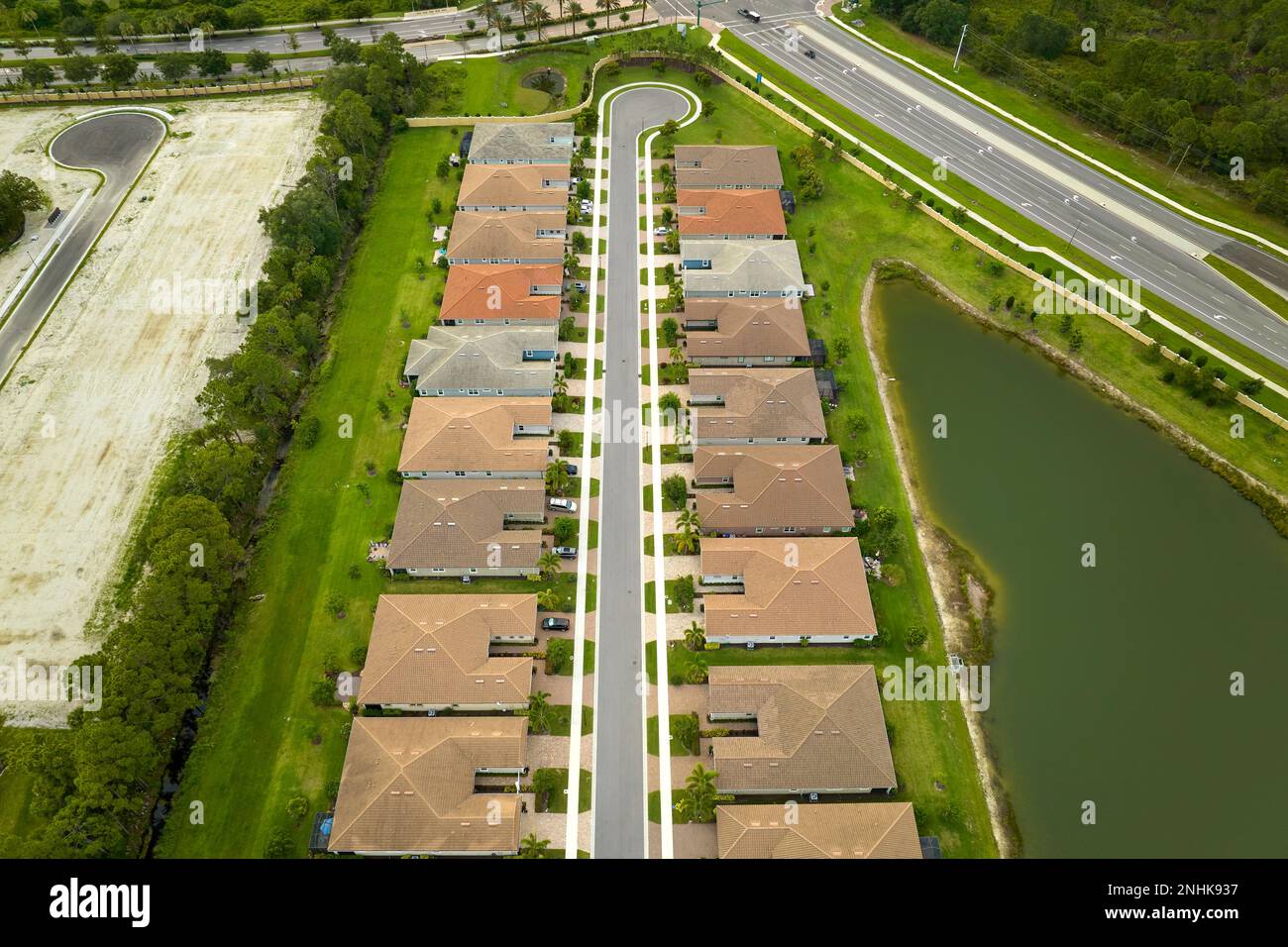 View from above of densely built residential houses in closed living ...