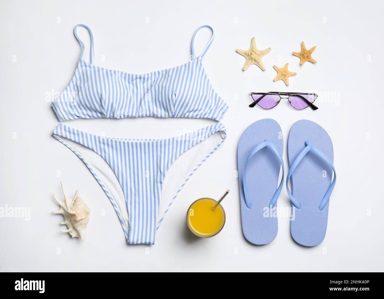 Flat lay composition with beach objects on white background Stock Photo ...