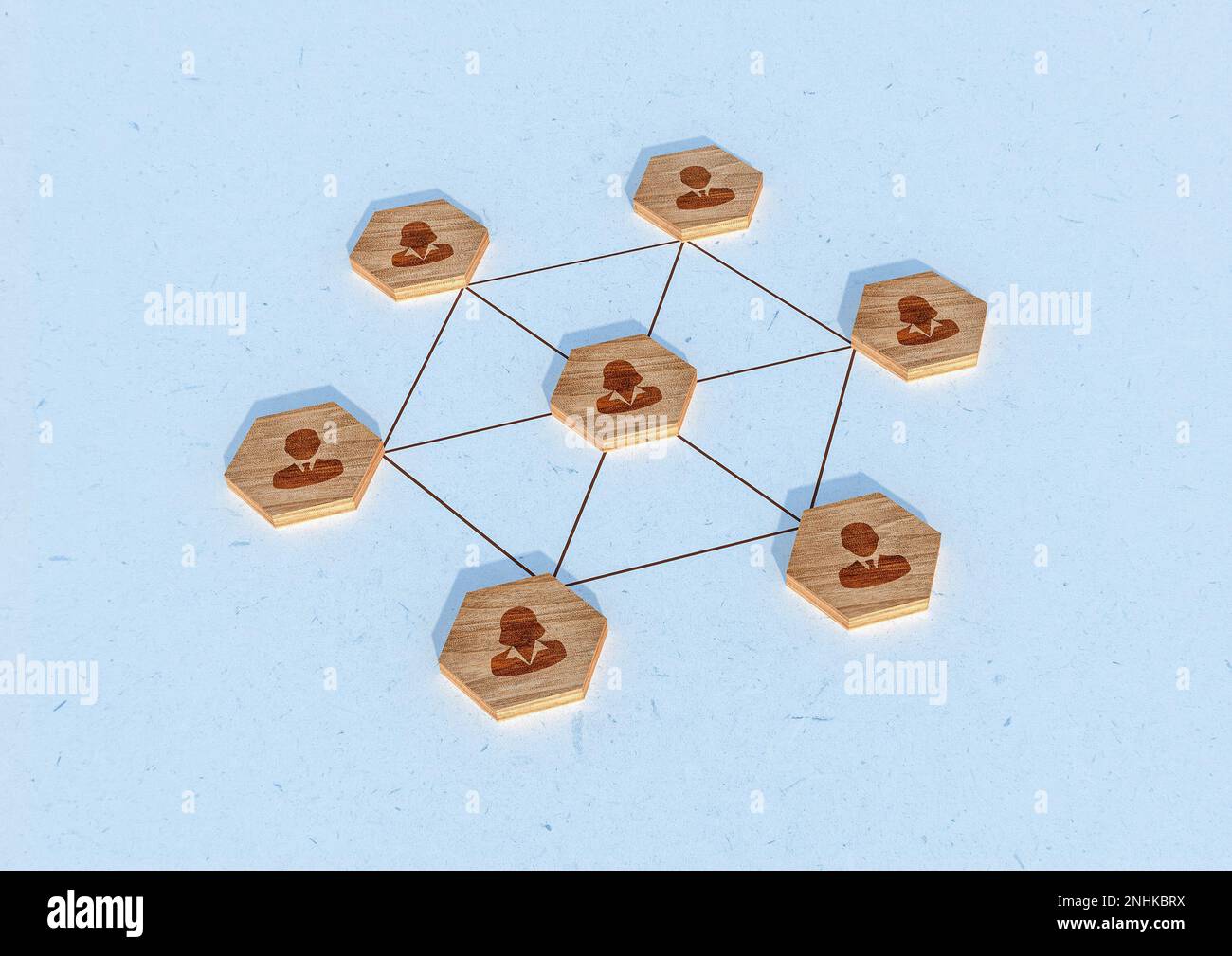 Wooden pieces representing People connected in a communication network ...