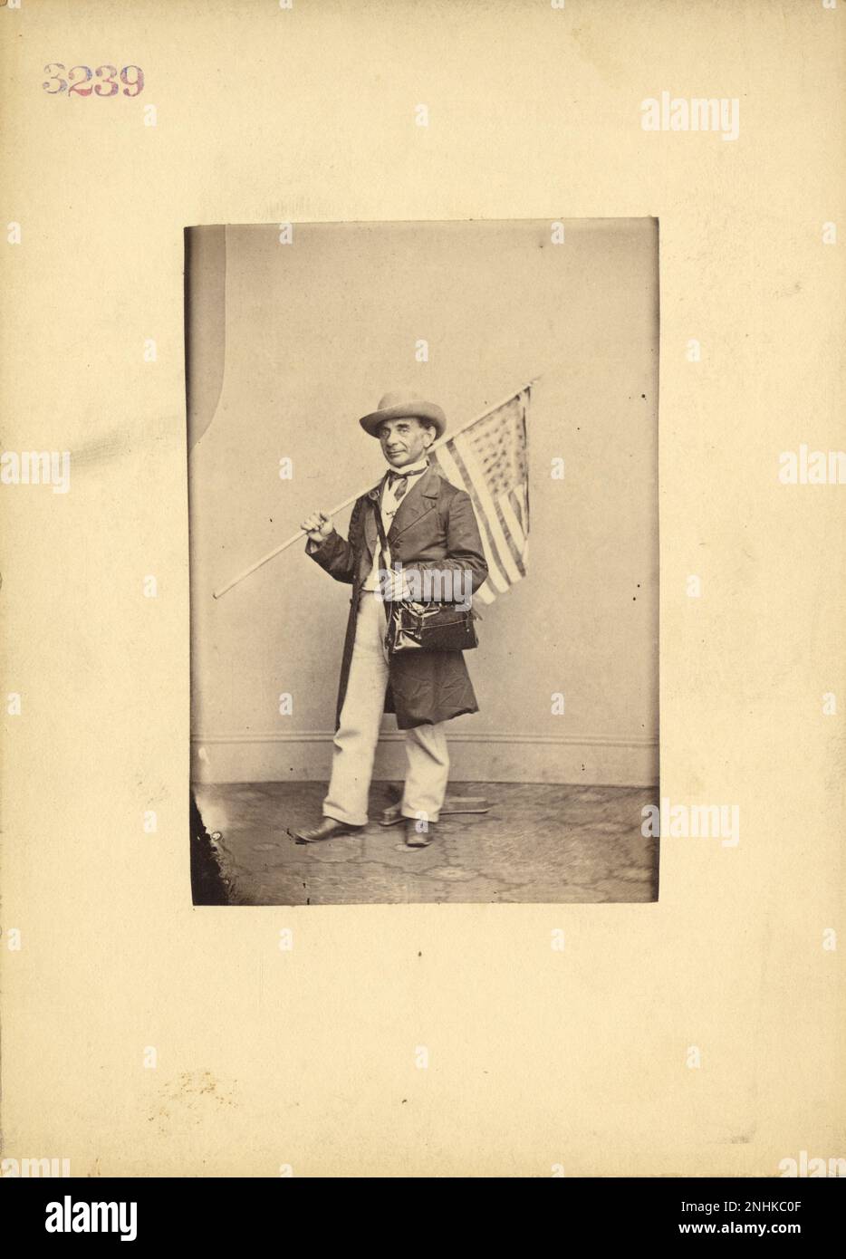 Man carrying U.S. Flag and satchel 19th Century Mathew Brady ...