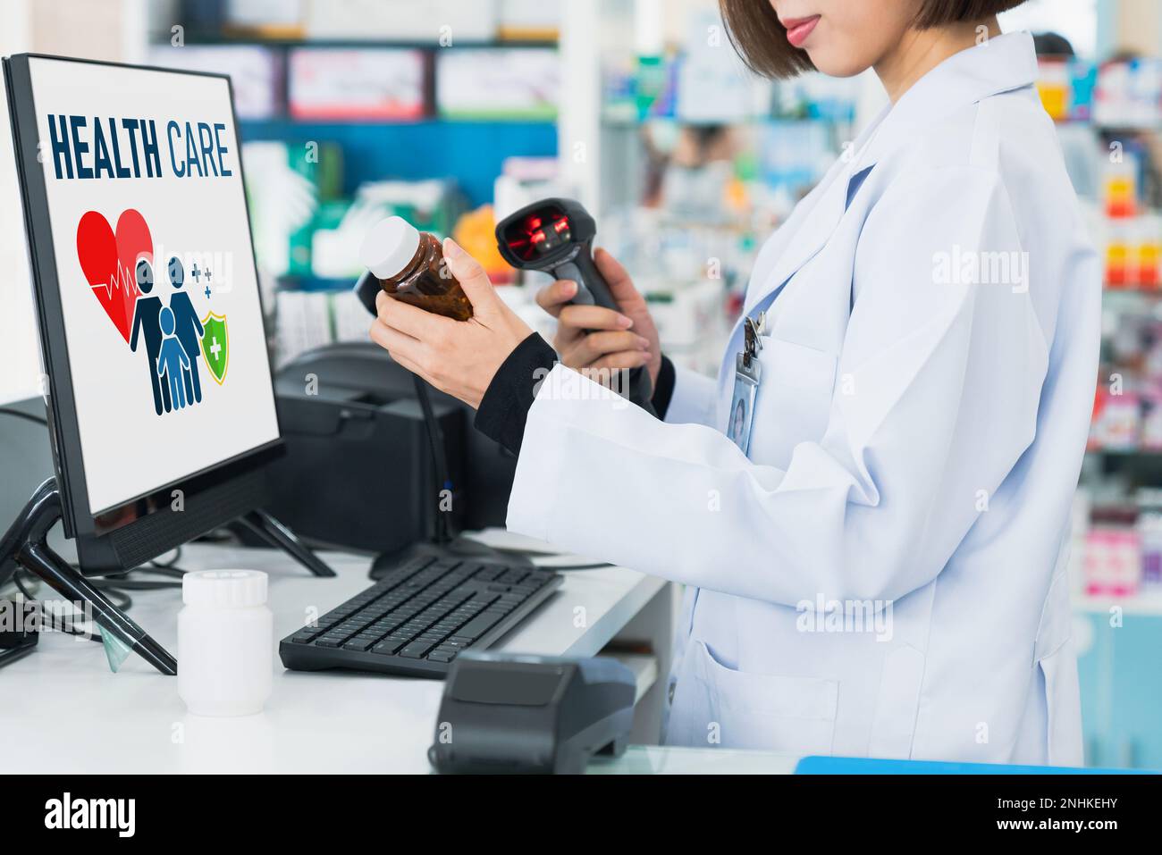 Pharmacist scanning medication scanner hi-res stock photography and ...