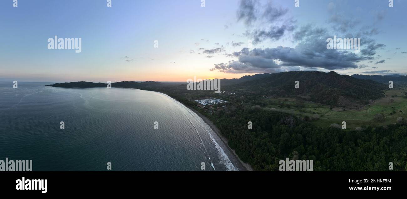 Lush Tropical coastline with rocks and blue water in Costa Rica near ...