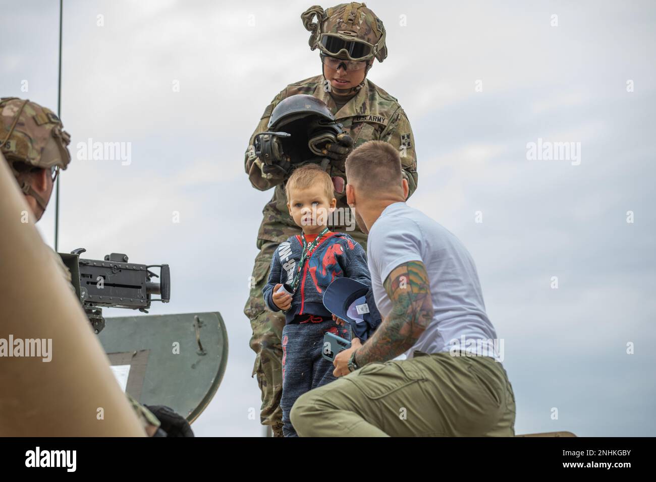 Poznan resident Adam Nowak shares a moment with his son, Tymon, atop a ...