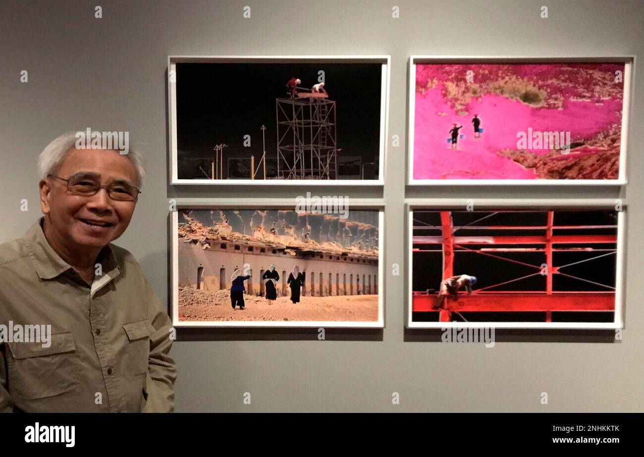 Photographer Tan Lip Seng with prints of his award-winning photo ...