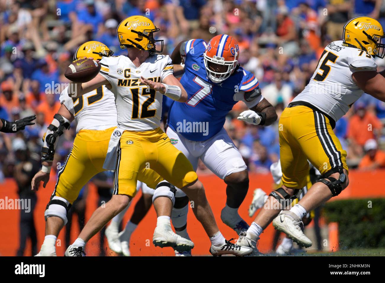 Missouri quarterback Brady Cook (12) throws a pass in front of Florida ...