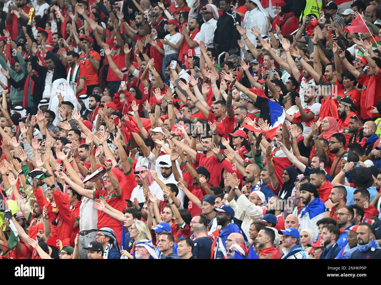 Spectators cheer during the FIFA World Cup semi-final match at Al Bayt ...