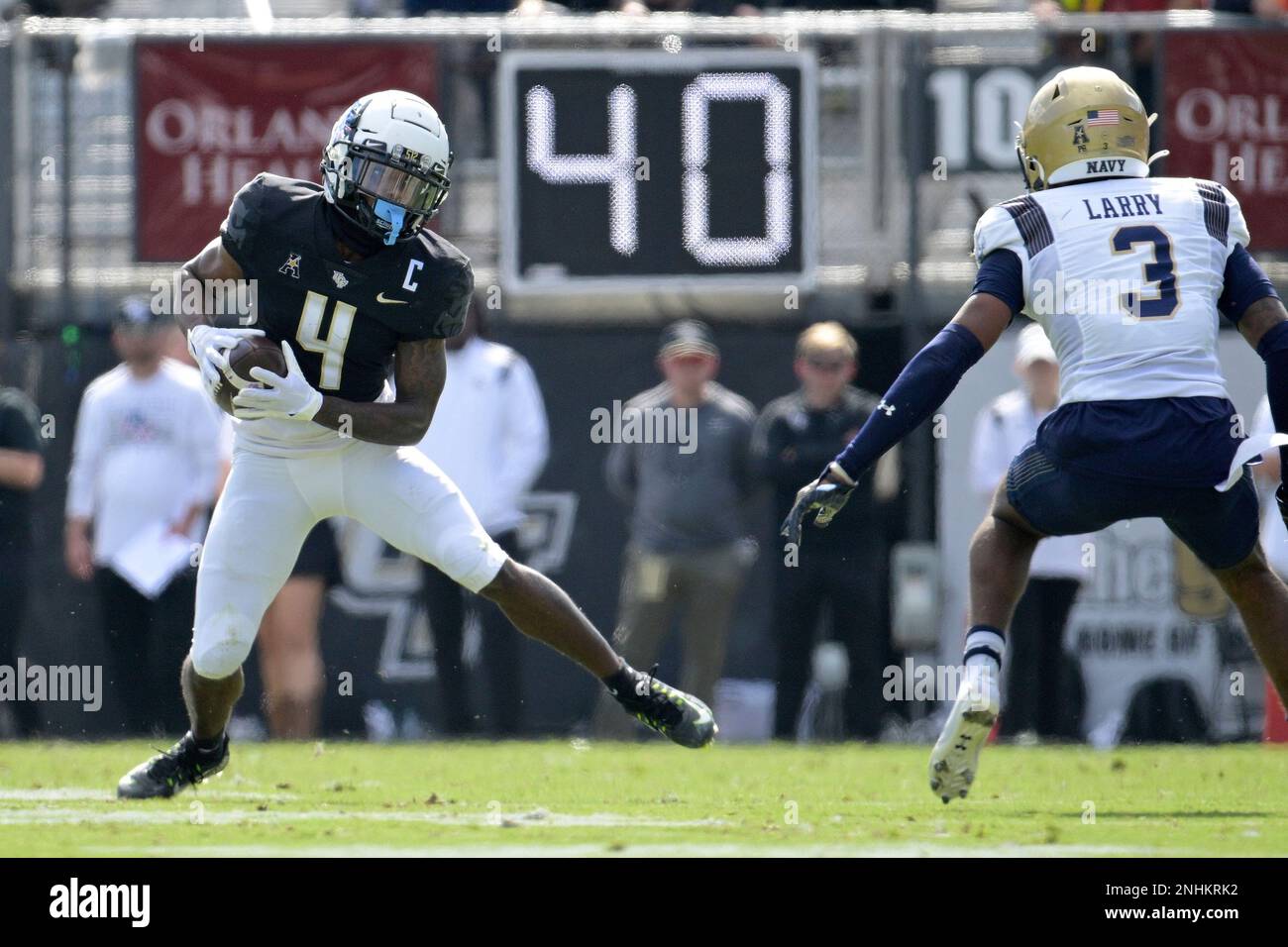 Central Florida wide receiver Ryan O'Keefe (4) catches a pass in front ...