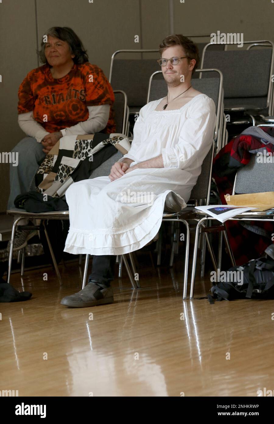 Performer/playwright Evan Johnson (in white) and actor Vicki Anderson ...