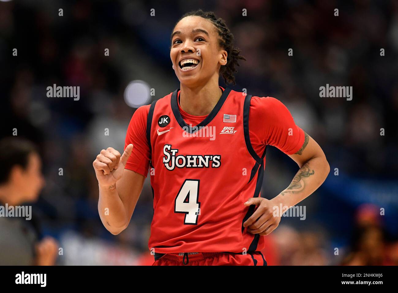 St. John's Jayla Everett (4) smiles after making a basket in the second ...