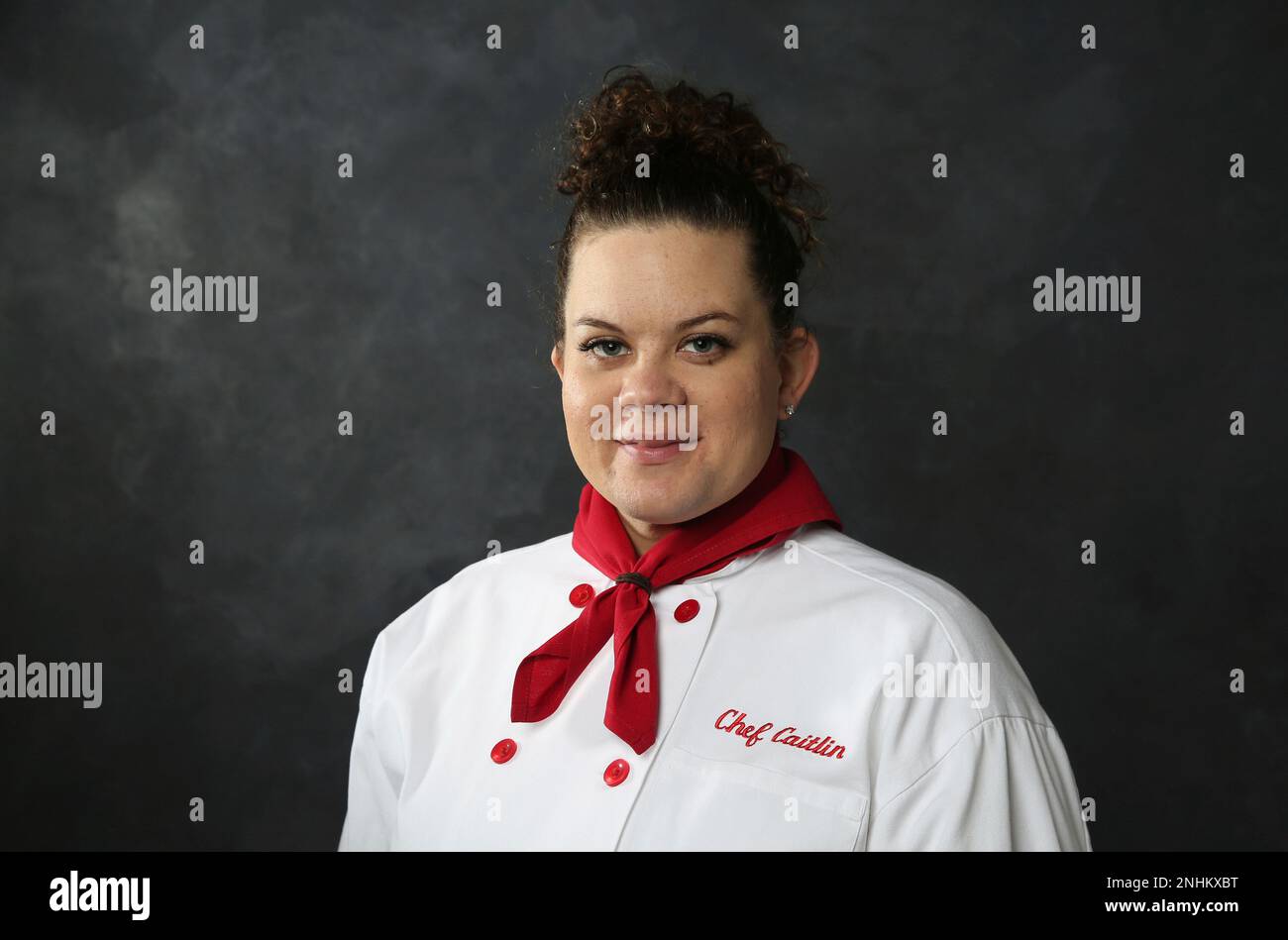 Carver Caitlin Elliott of House of Prime Rib being photographed at the ...