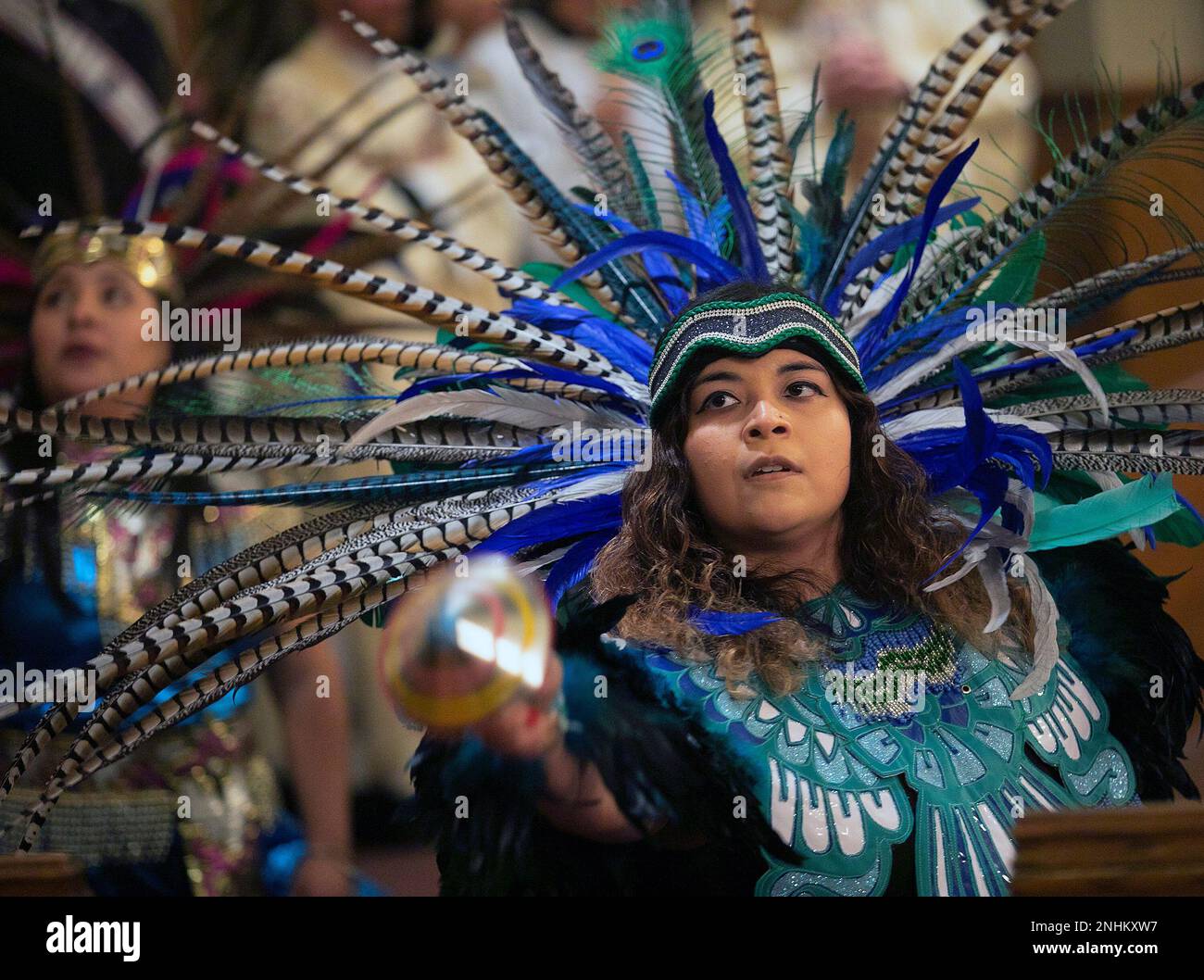 Danya Cerna, of Wallingford, performs as an Aztec dancer during the ...