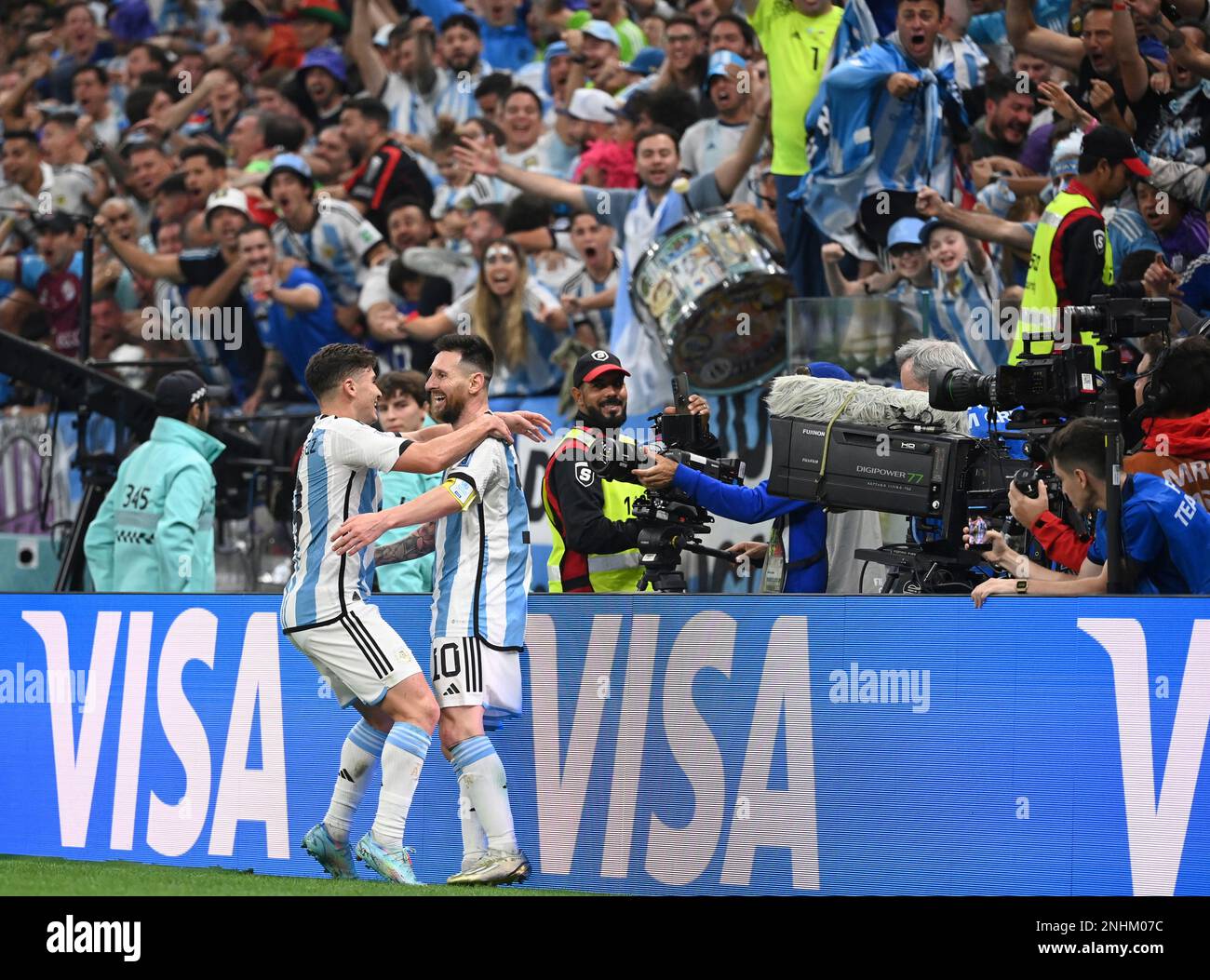 Argentina's Julian ALVAREZ celebrates with Lionel MESSI after scoreing ...