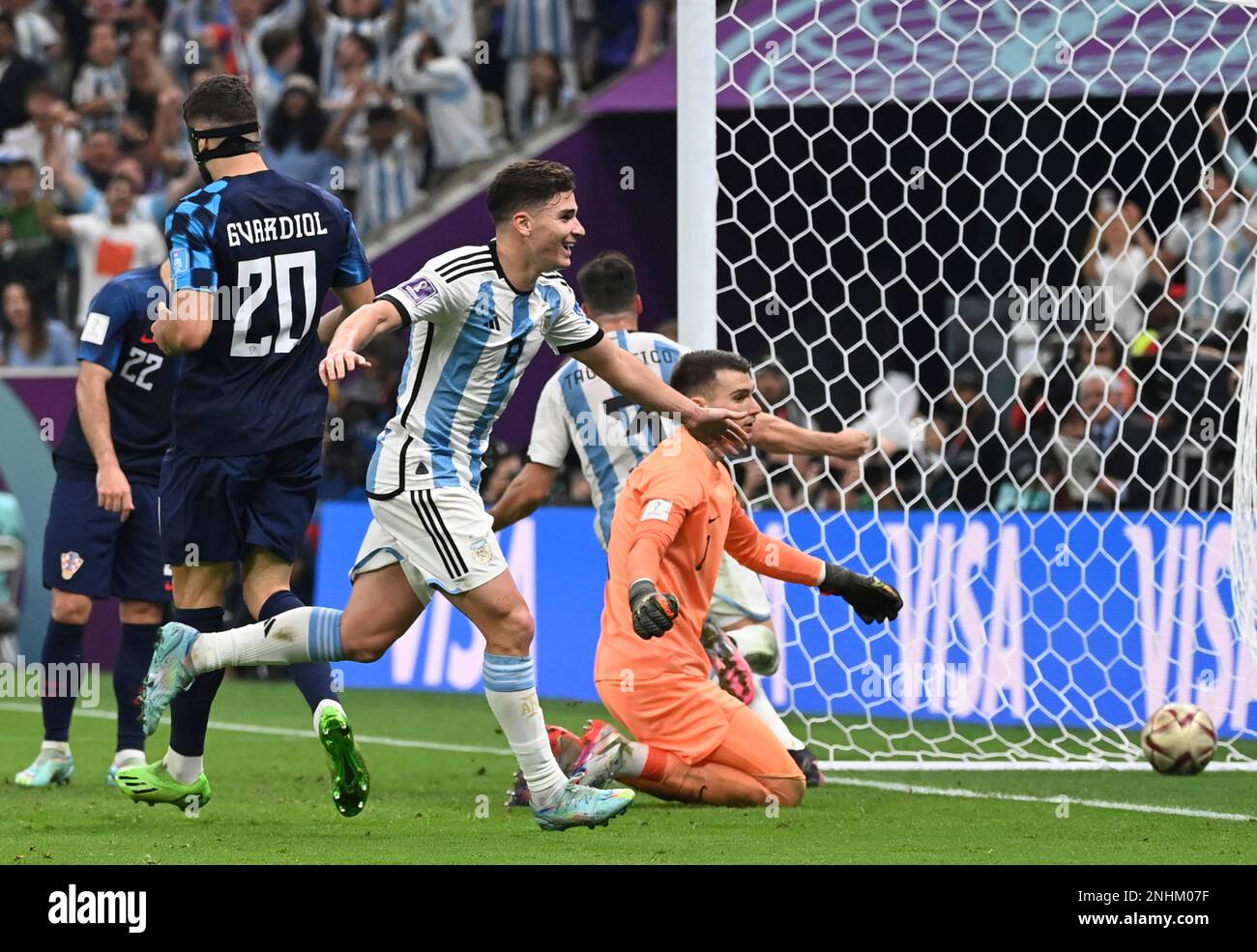 Argentina's Julian ALVAREZ celebrates after scoreing a team and his ...