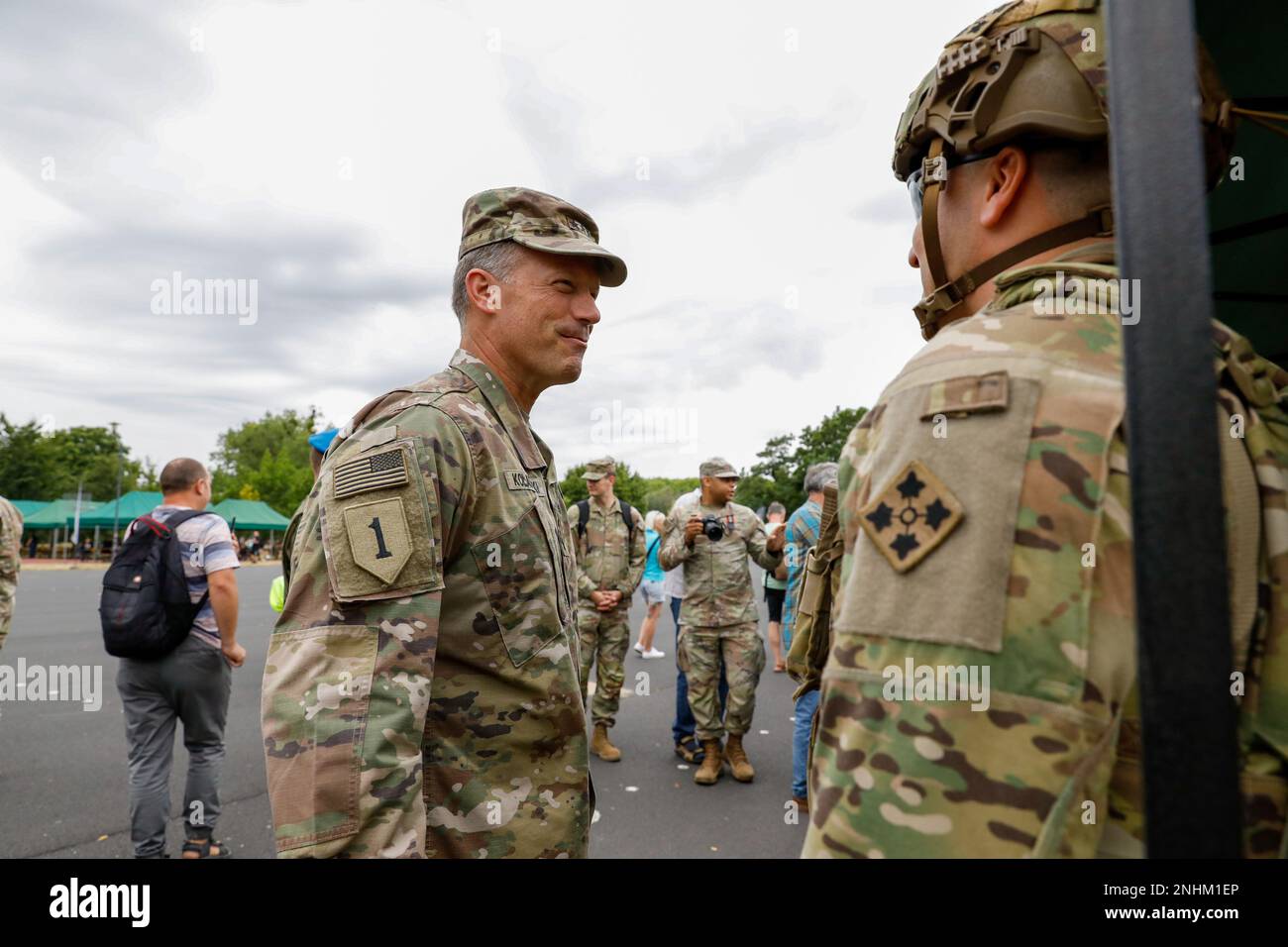 U.S. Army Lt. Gen. John Kolasheski, commander of V Corps, speaks with U.S. Army Staff Sgt. Marco ...