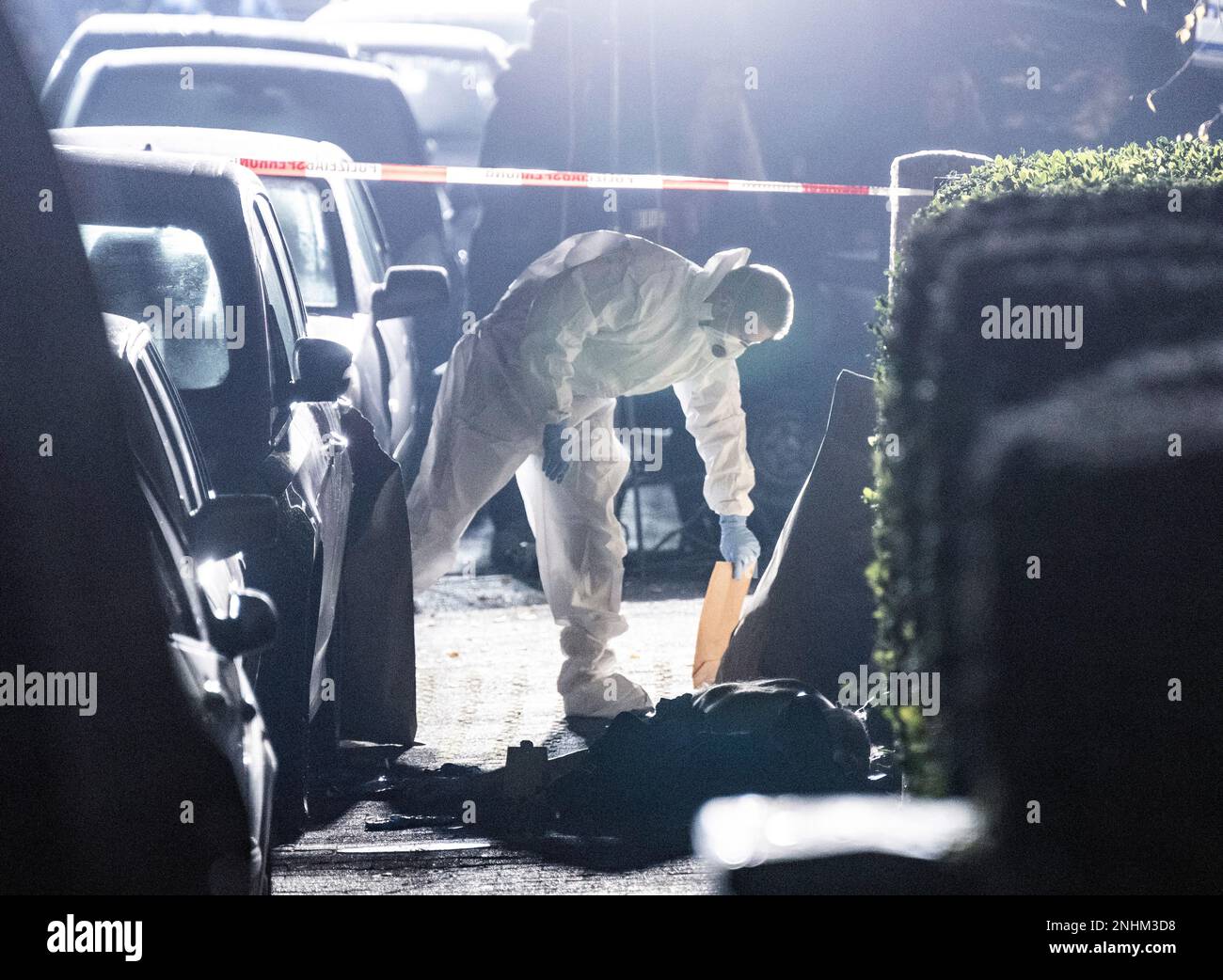 Forensic officers work at a crime scene in Frankfurt/Main, Germany ...