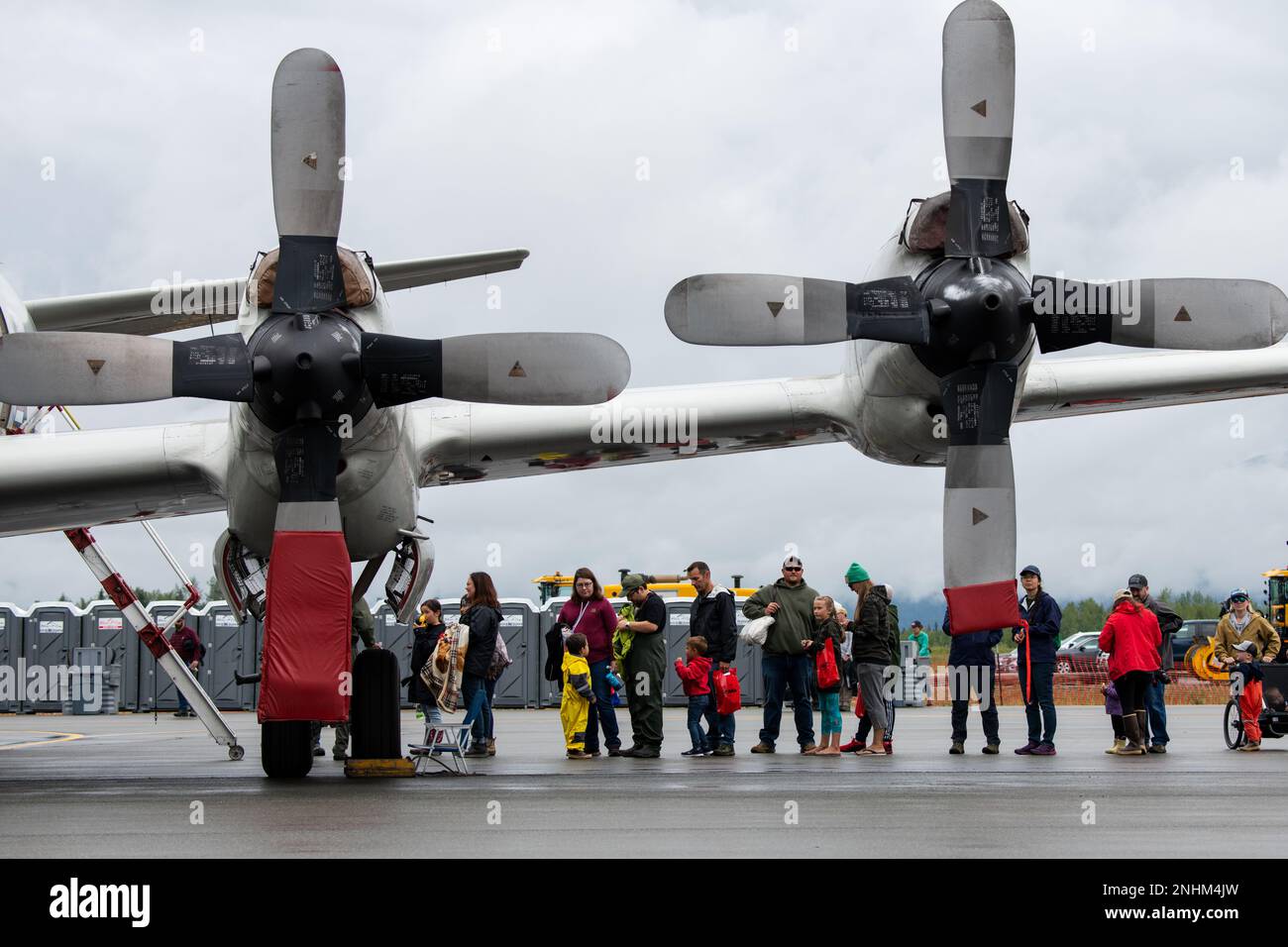 A crowd waits to see inside a static display at the Arctic Thunder Open ...
