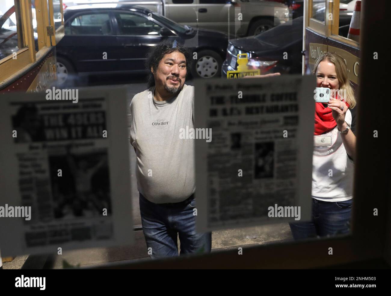 Frank Zepeda (left) and Chronicle reporter Heather Knight (right) look ...